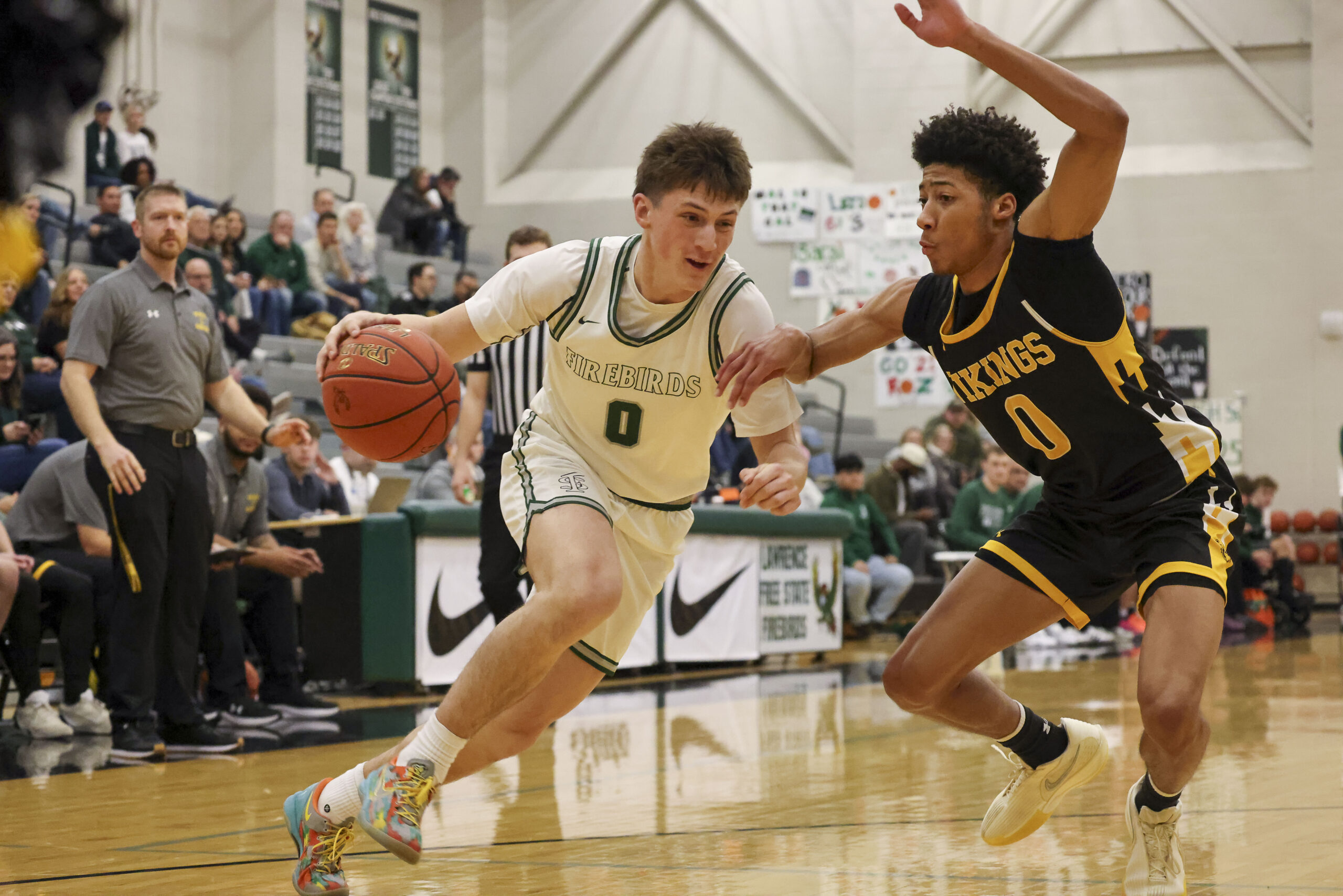 Free State boys basketball gets first league win, girls fall against ...